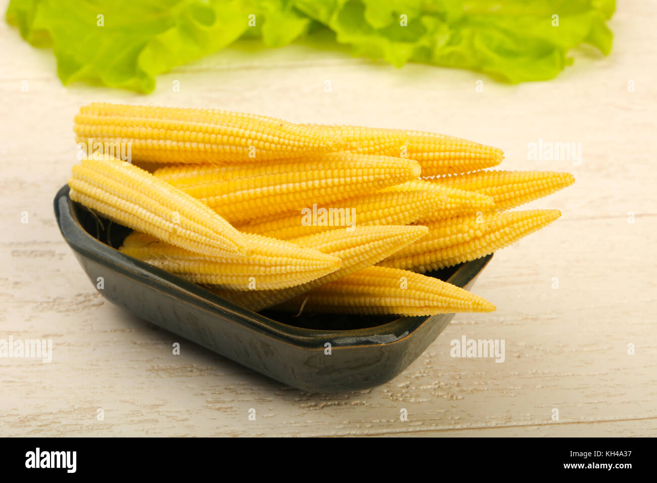 Young raw baby corn Stock Photo - Alamy