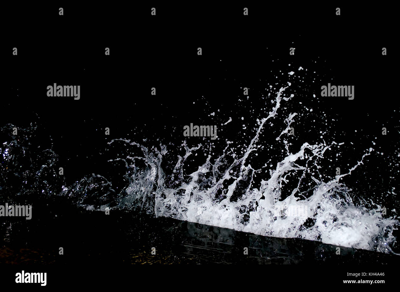 Splashing wave on the Black sea in the night Stock Photo - Alamy