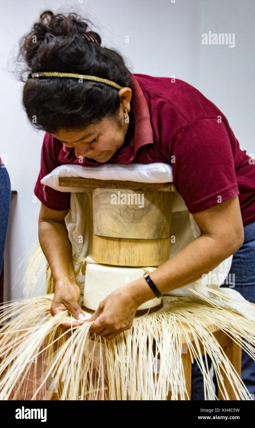 Woman demonstrates weaving of Panama Hat in Puerto Lopez, Ecuador on ...