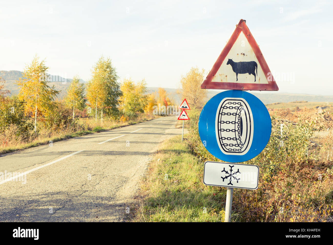 Snow and slippery road warning signs hi-res stock photography and ...