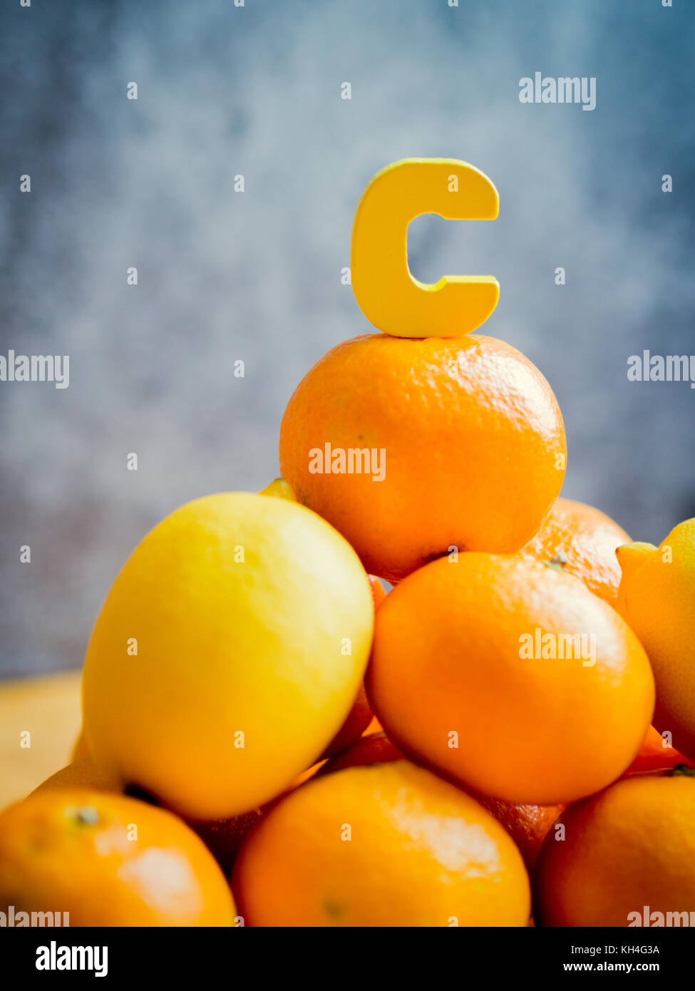 Letter C on citrus fruits representing vitamin C Stock Photo - Alamy