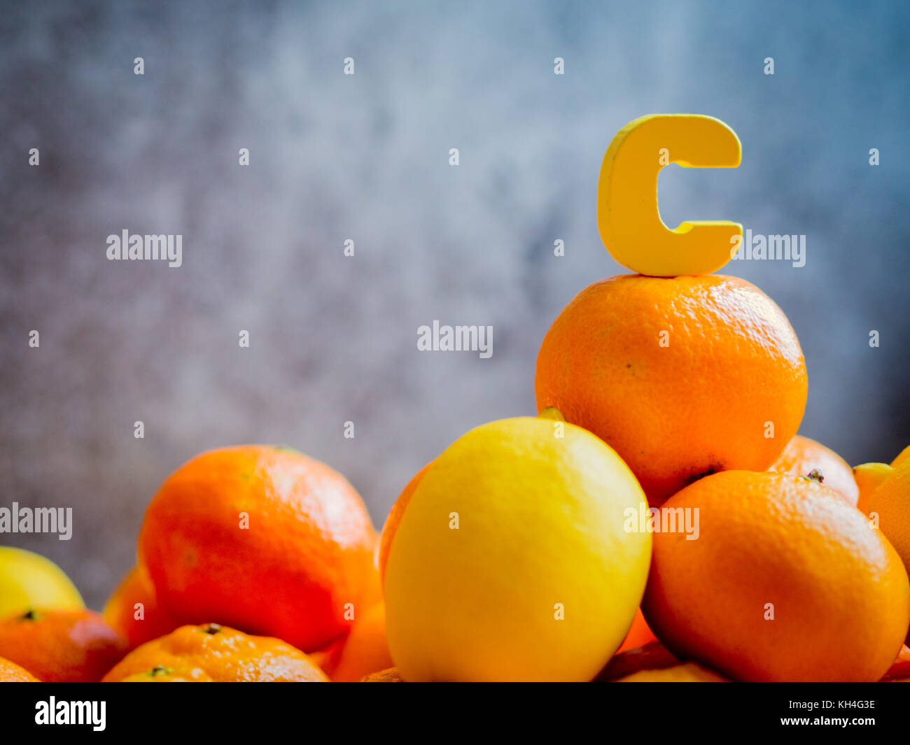 Letter C on citrus fruits representing vitamin C Stock Photo - Alamy