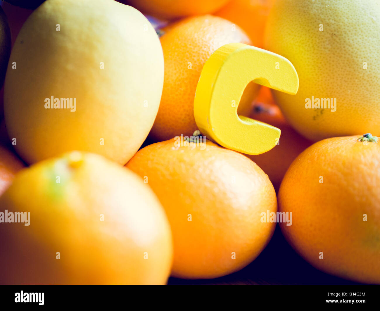Letter C on citrus fruits representing vitamin C Stock Photo - Alamy