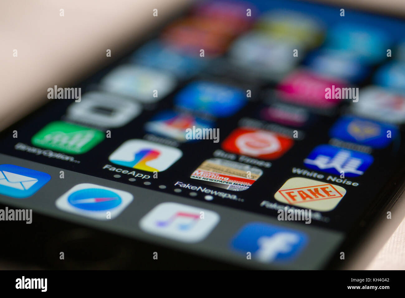 Concept image of fake news, featuring FAKE App in prominent focus ...