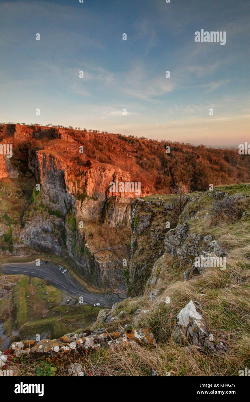 A view from the cliff edge of Cheddar Gorge, Somerset at sunset ...