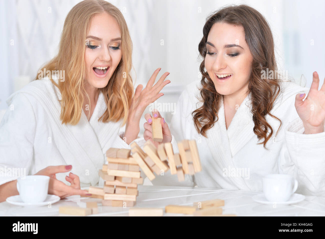 women playing with blocks Stock Photo - Alamy