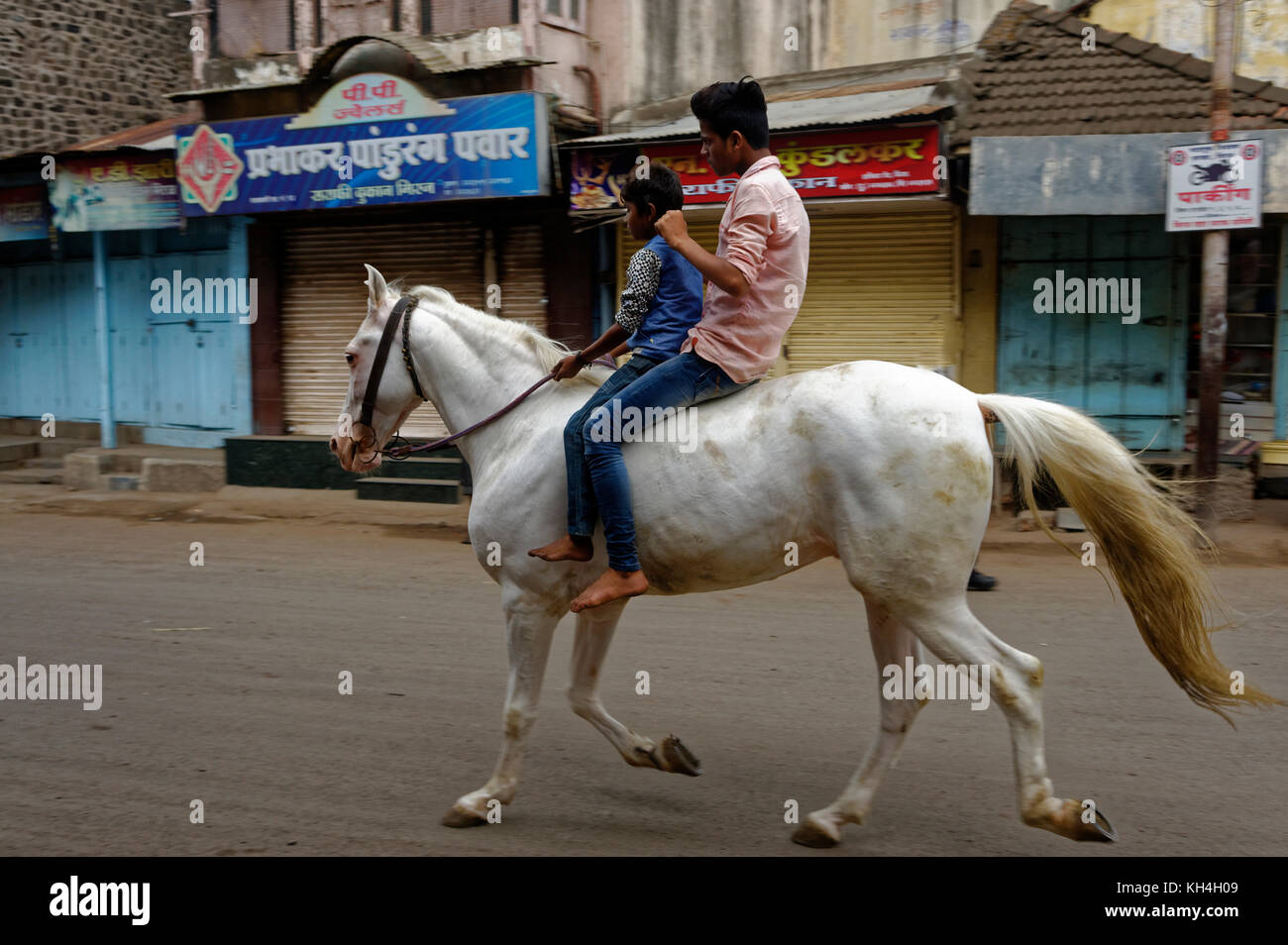 Boy Riding A Horse