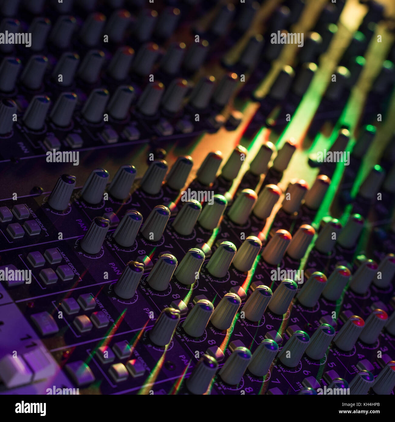 Sound music mixer control panel on colourful light, France Stock Photo ...