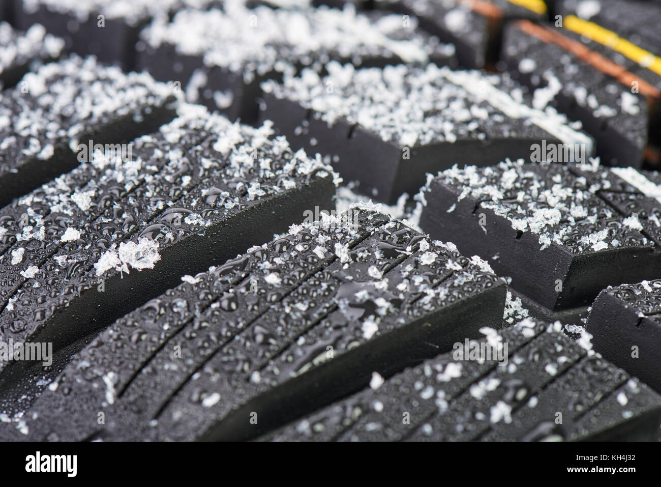 New winter tire covered with snow Stock Photo - Alamy