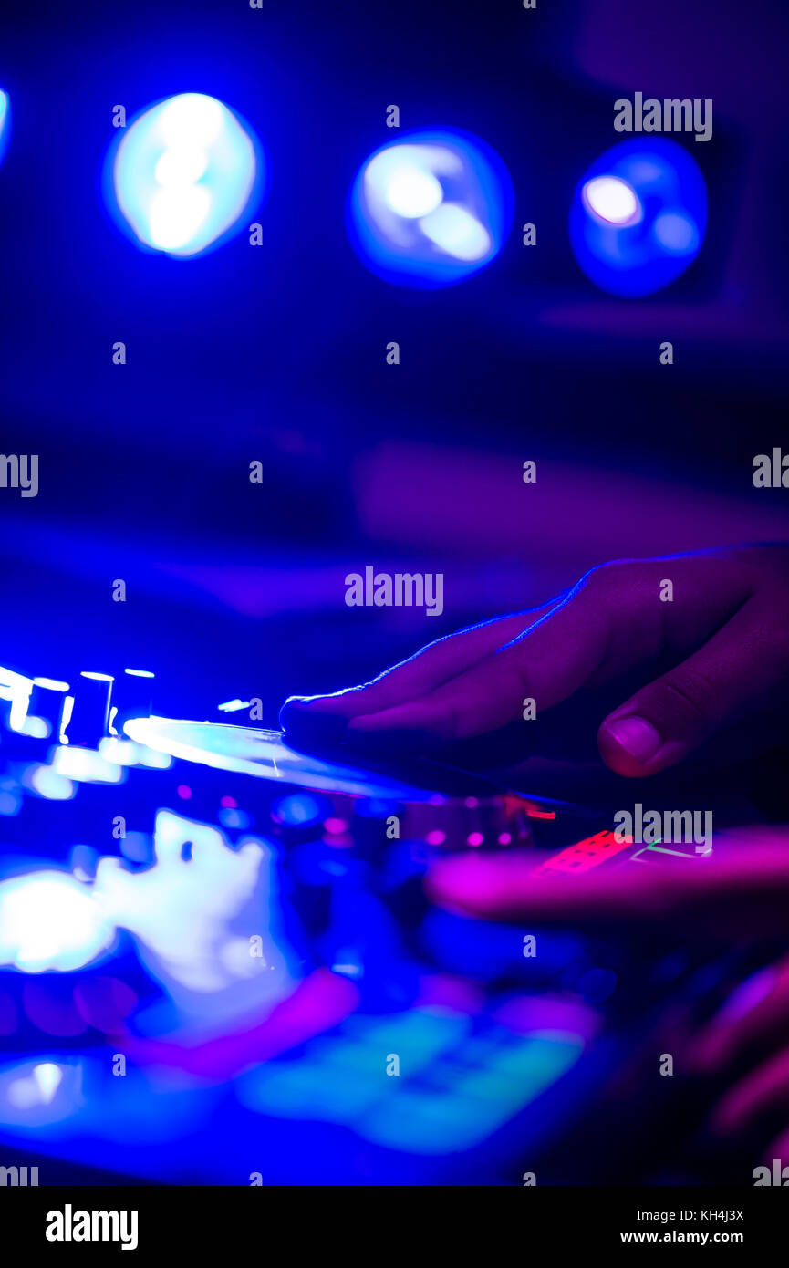 Hands and finger Disc jockey at the turntable dj plays on the best ...