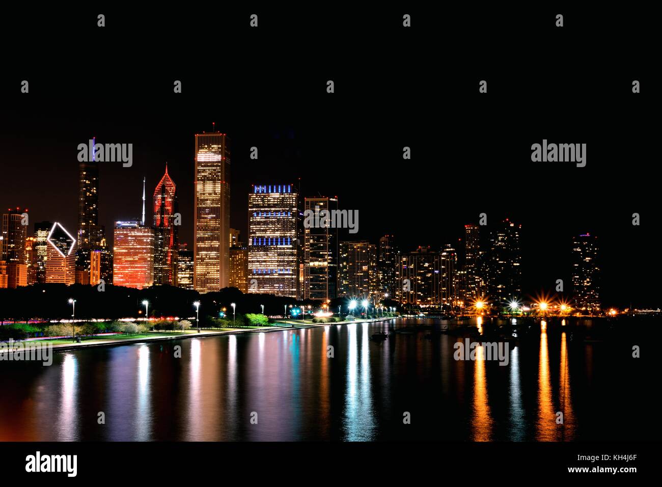 Chicago night skyline across Lake Michigan Stock Photo - Alamy