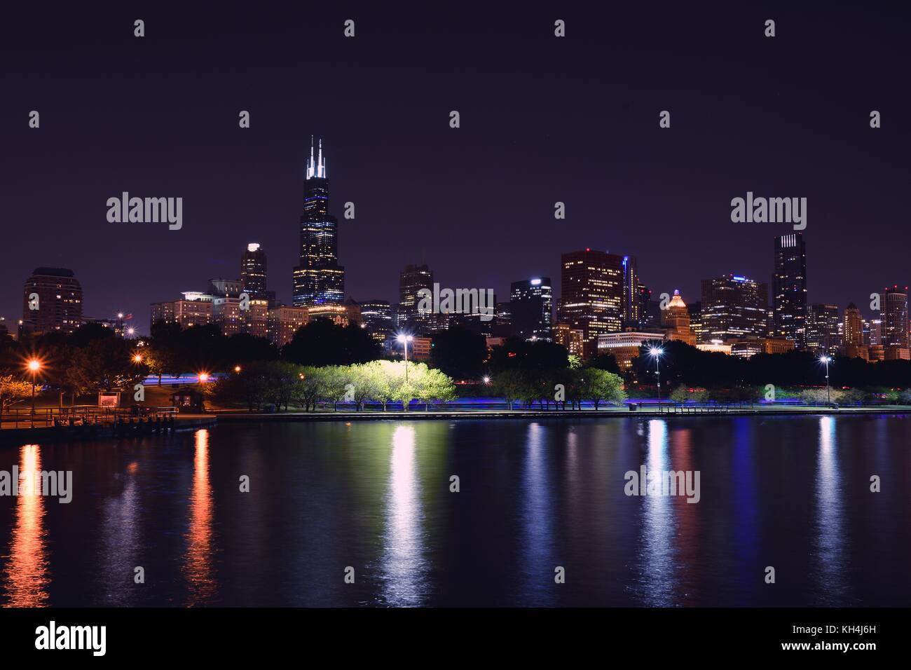 Chicago night skyline across Lake Michigan Stock Photo - Alamy