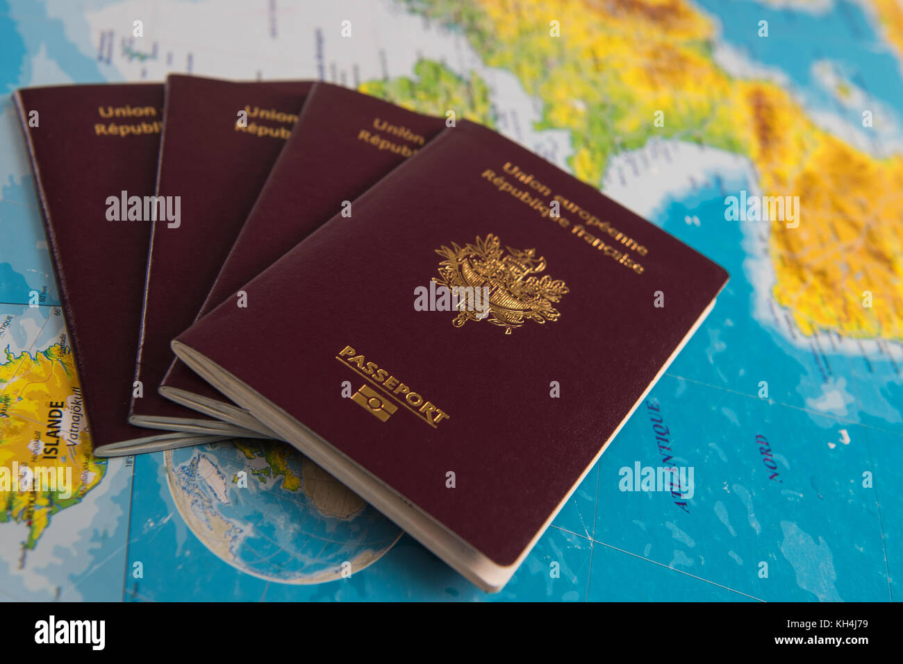 French passports on map and plane background, France Stock Photo - Alamy