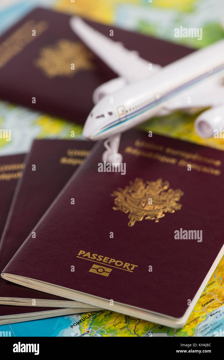 French passports on map and plane background, France Stock Photo - Alamy