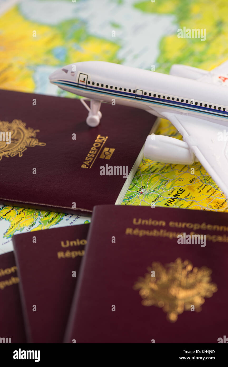 French passports on map and plane background, France Stock Photo - Alamy
