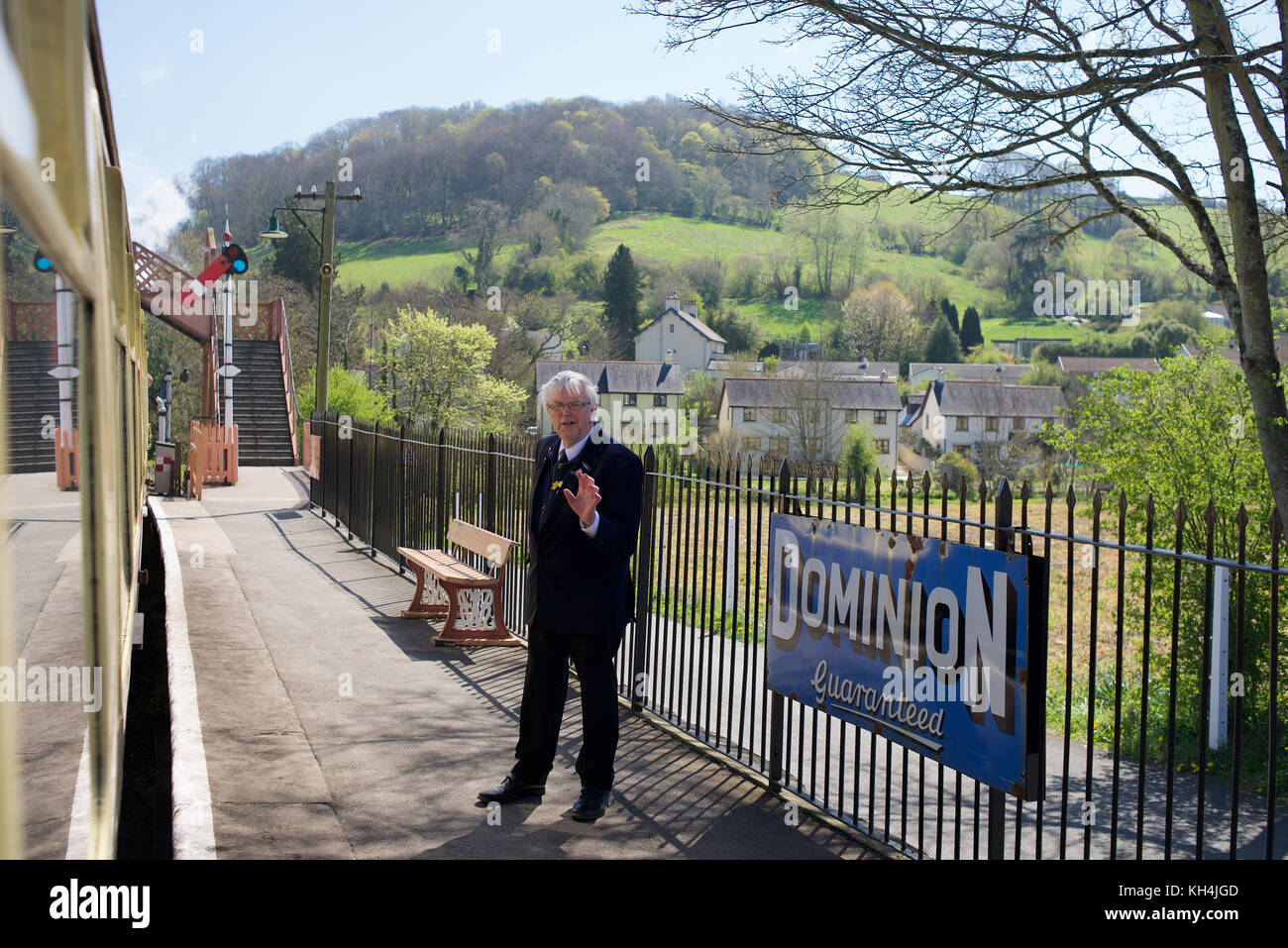 Platform staff waving at Buckfastleigh on the South Devon Railway Stock ...