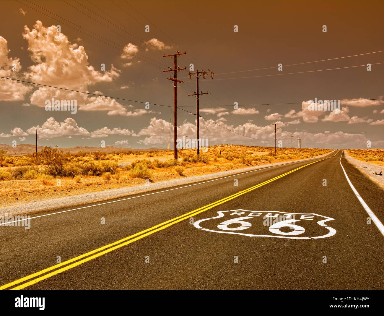 U.S. Route 66 highway, with sign on asphalt on California Stock Photo ...
