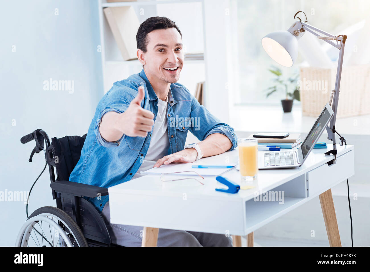 Positive delighted man being satisfied Stock Photo - Alamy