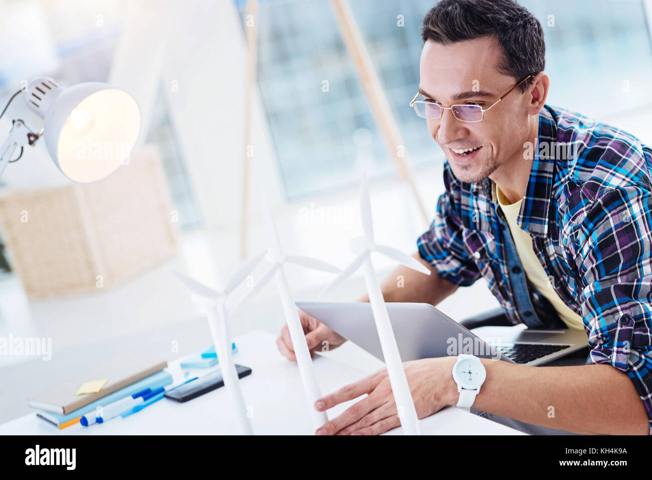 Attentive office worker being at his workplace Stock Photo - Alamy