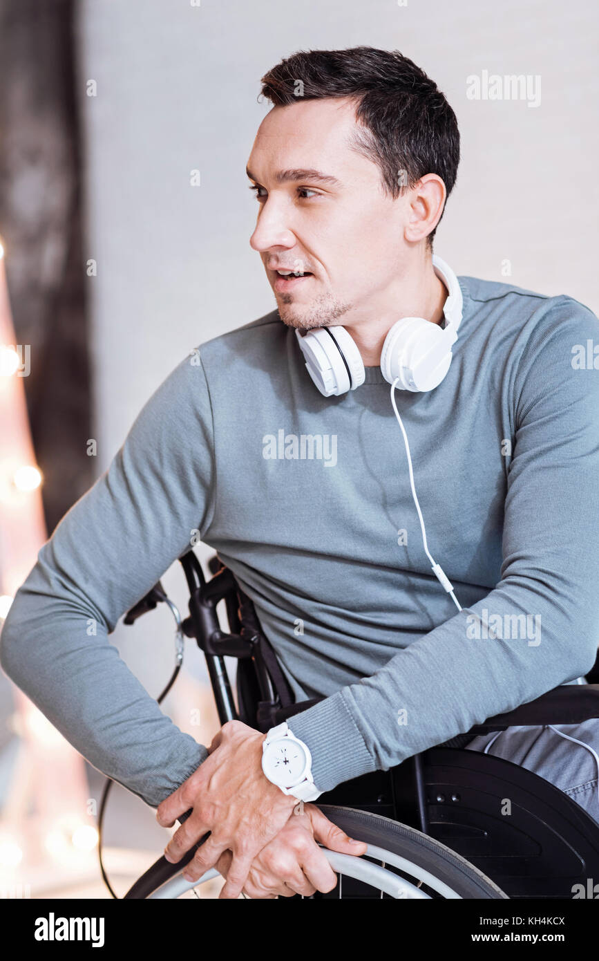 Handsome male person looking sideways Stock Photo - Alamy