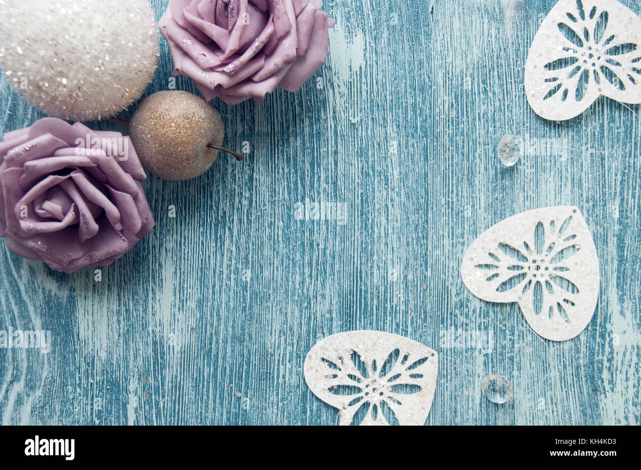 Christmas roses on wooden blue background Stock Photo - Alamy