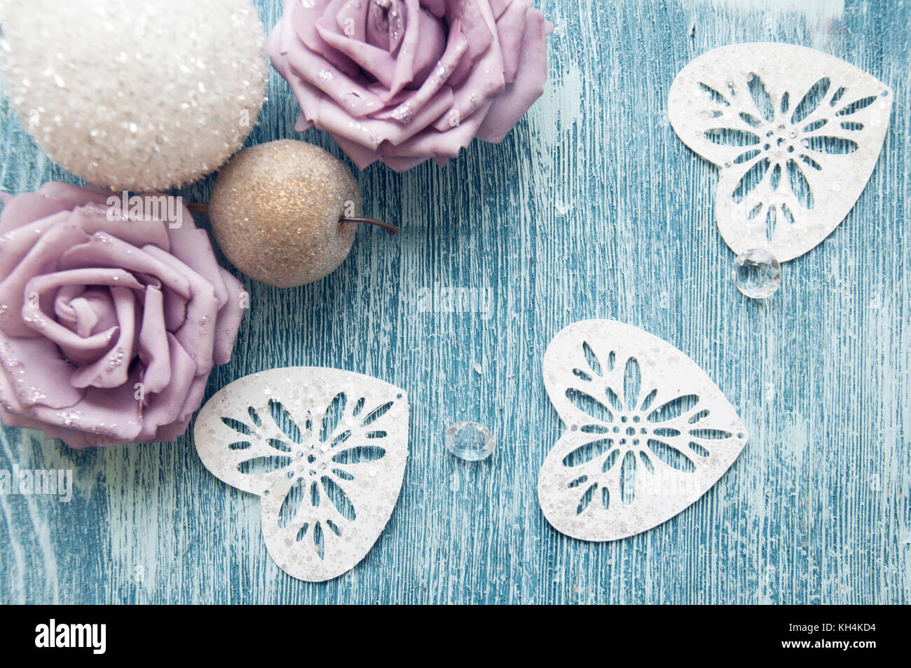 Christmas roses on wooden blue background Stock Photo - Alamy