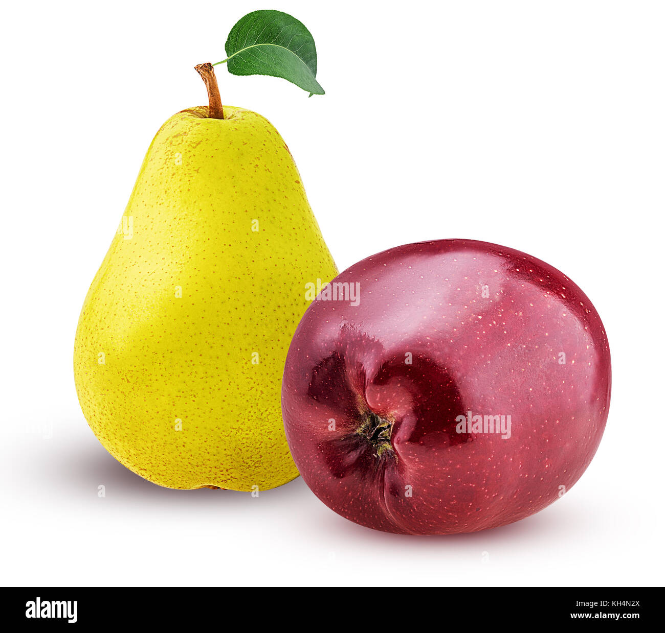 Yellow pear and red apple with leaf isolated on white background ...