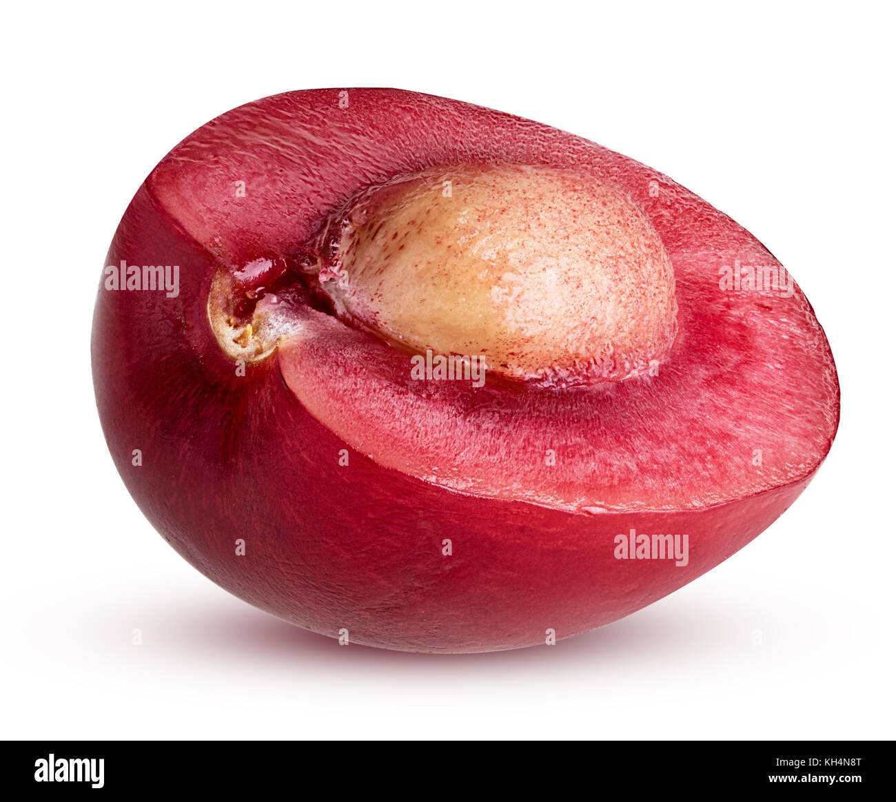 Sweet cherry berry cut in half with bone isolated on white background ...