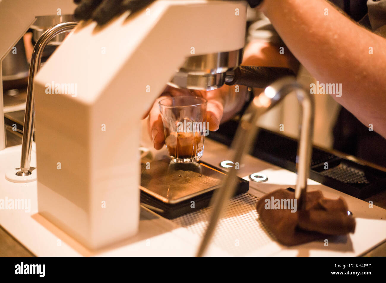Barista Brewing Espresso Shot from Espresso Machine Stock Photo - Alamy