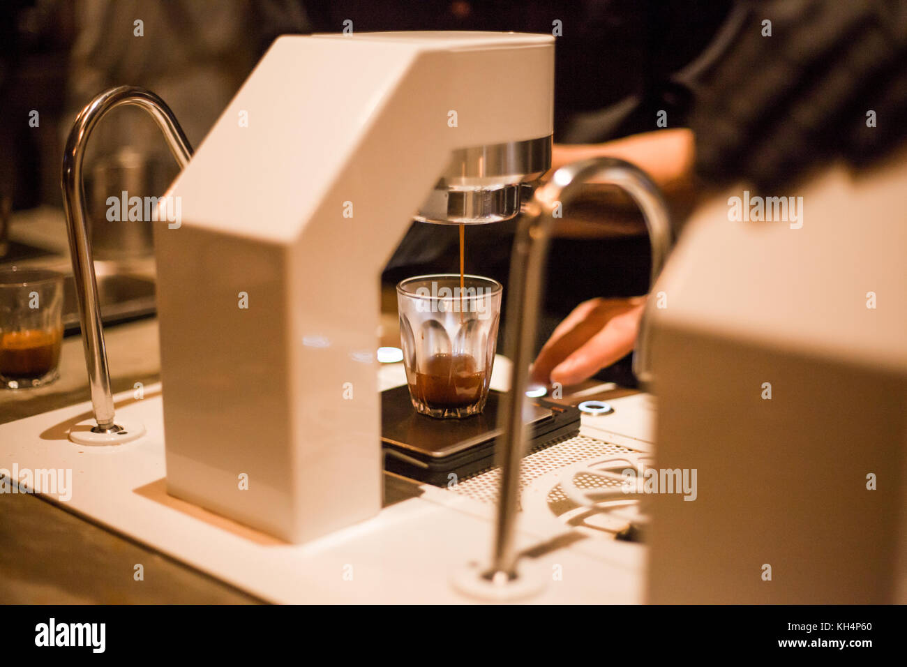Barista Brewing Espresso Shot from Espresso Machine Stock Photo - Alamy