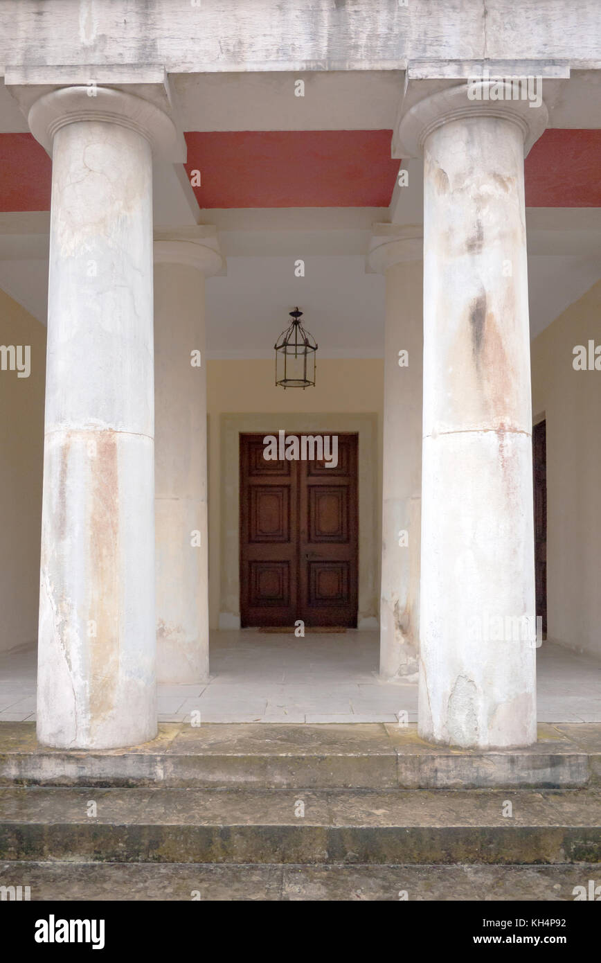 entrance with columns of a historic building in Mon Repo in Corfu ...