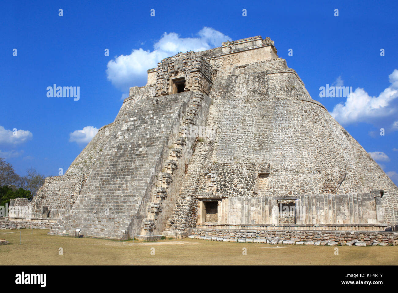 Ancient Mayan pyramid of the Magician in Uxmal with god Chaac masks ...