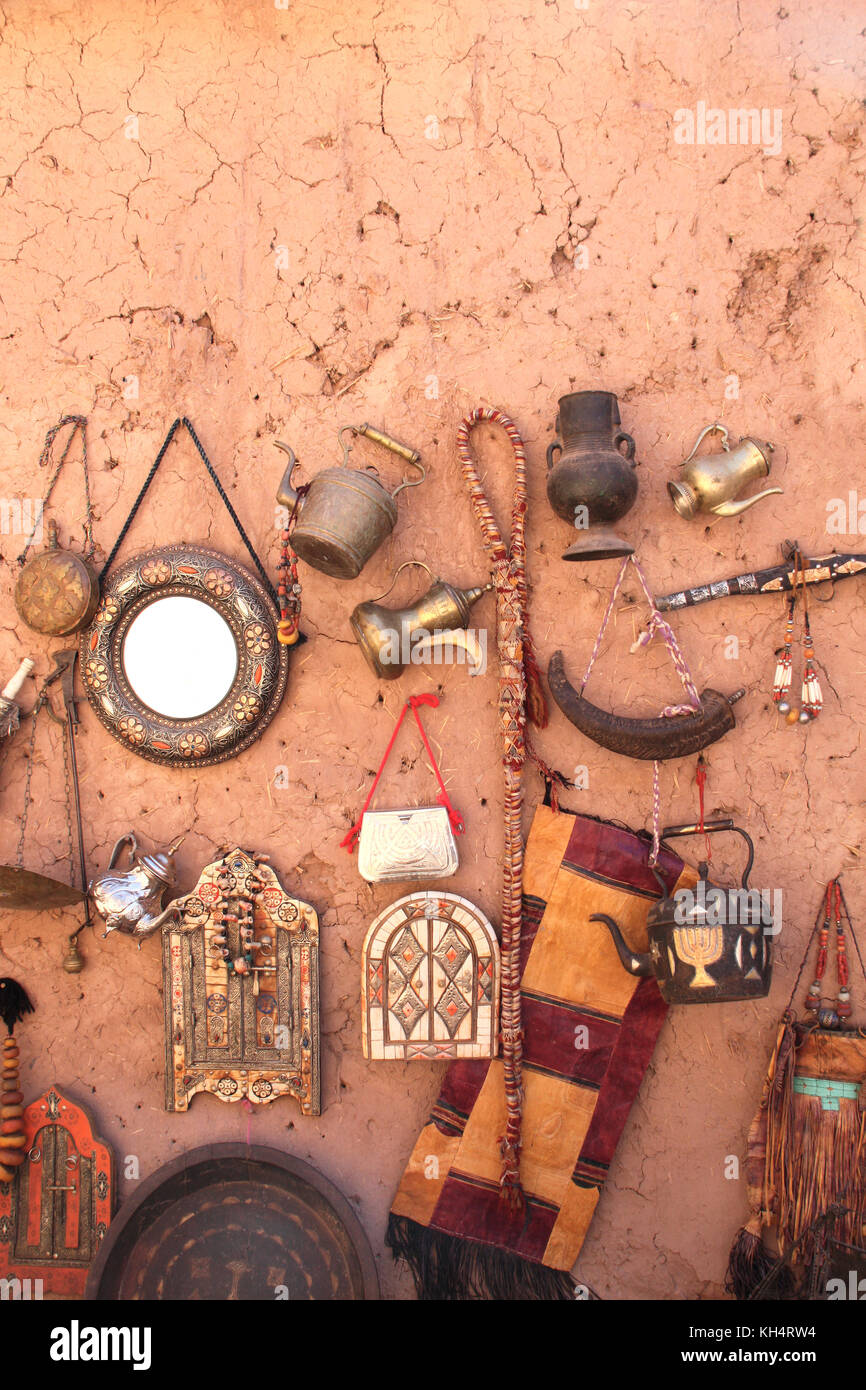 Traditional moroccan souvenirs - dagger, kettle, jug, window-mirror ...