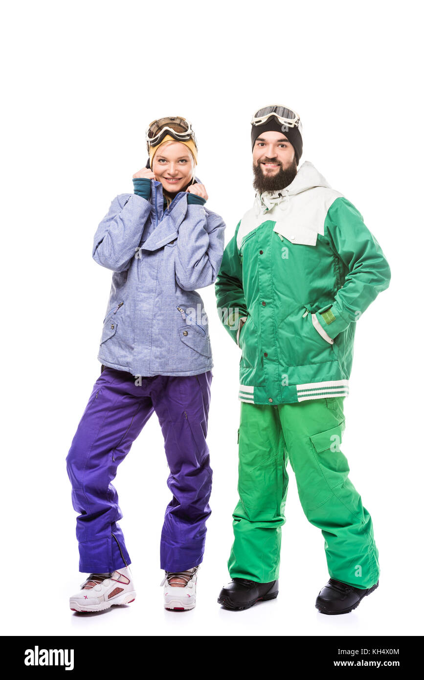 happy couple in snowboarding costumes Stock Photo - Alamy
