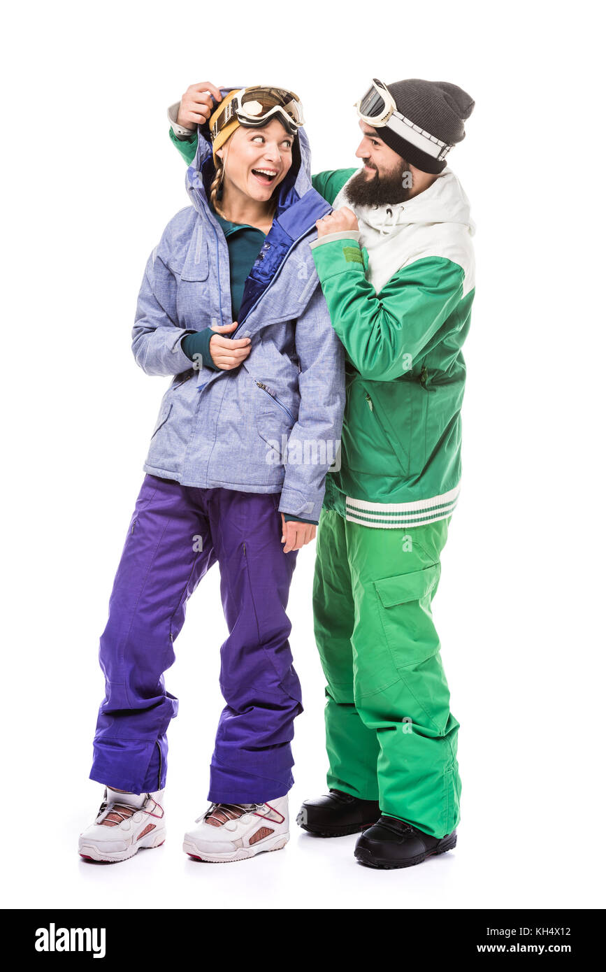 happy couple in snowboarding costumes Stock Photo - Alamy