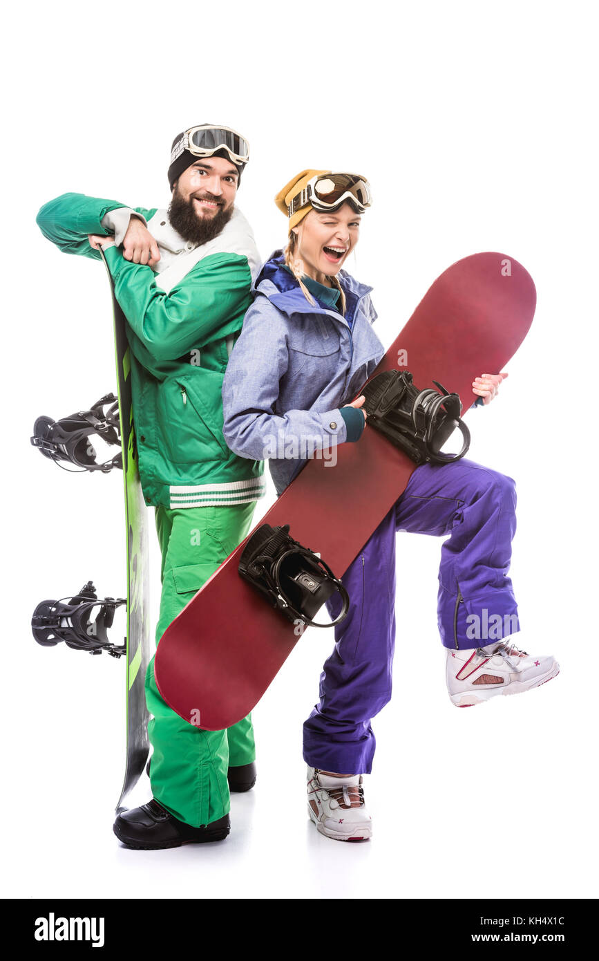 couple in snowboarding costumes with snowboards Stock Photo - Alamy