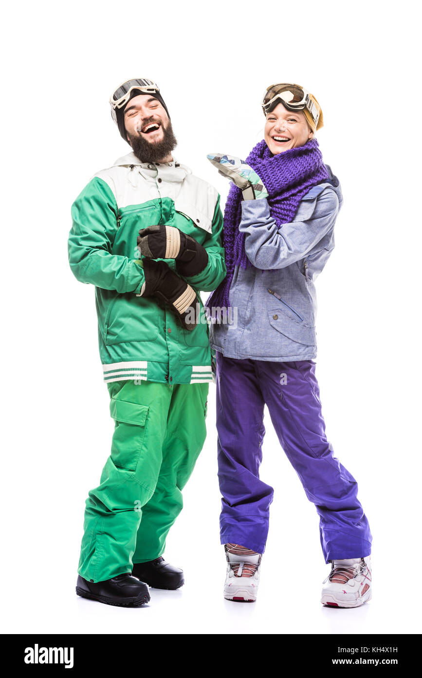happy couple in snowboarding costumes Stock Photo - Alamy