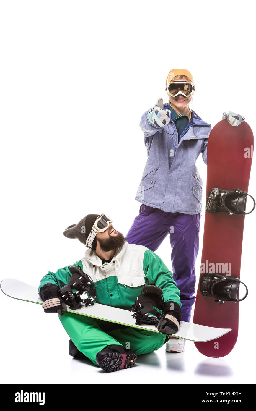 couple in snowboarding costumes with snowboards Stock Photo - Alamy