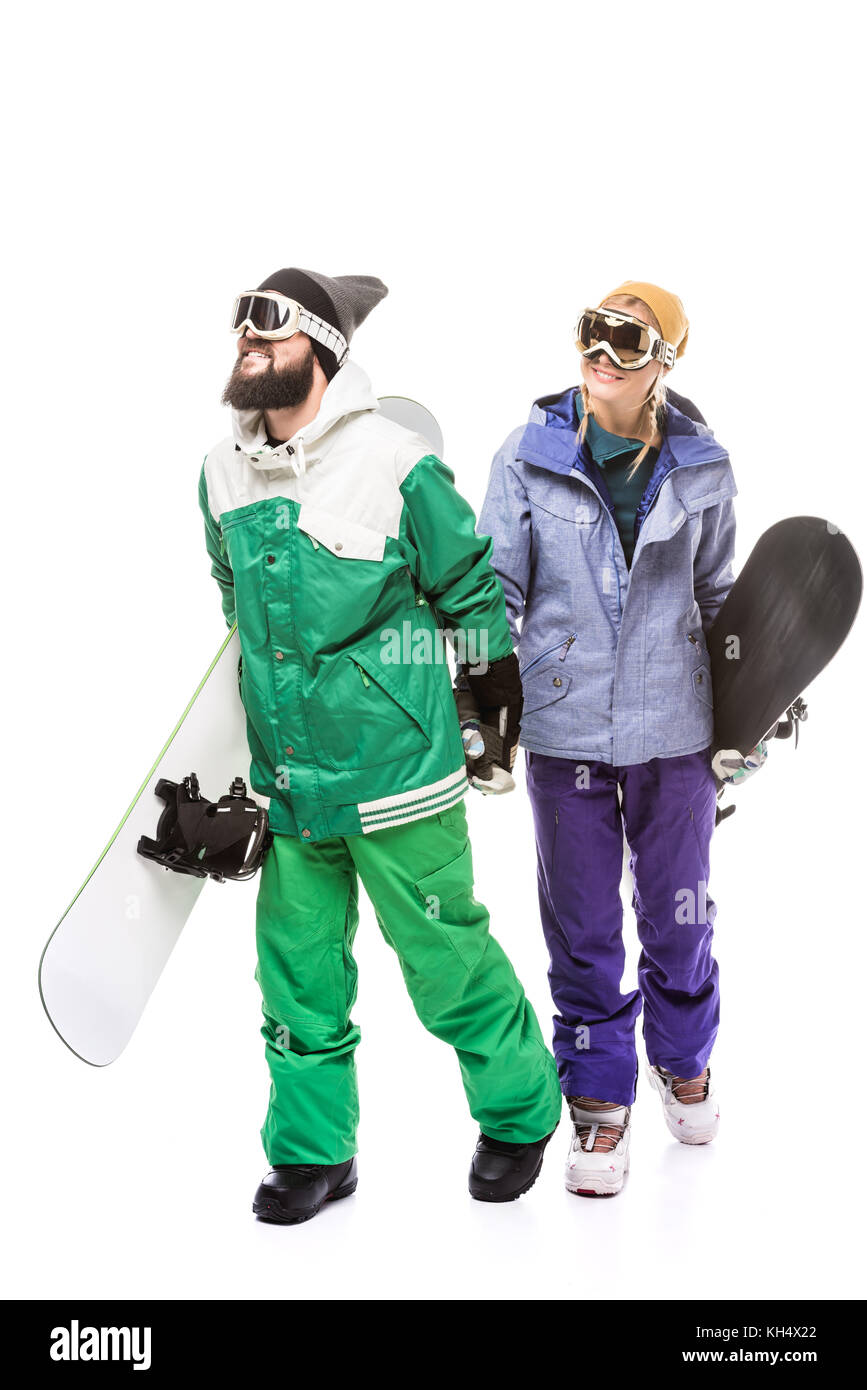 couple in snowboarding costumes with snowboards Stock Photo - Alamy
