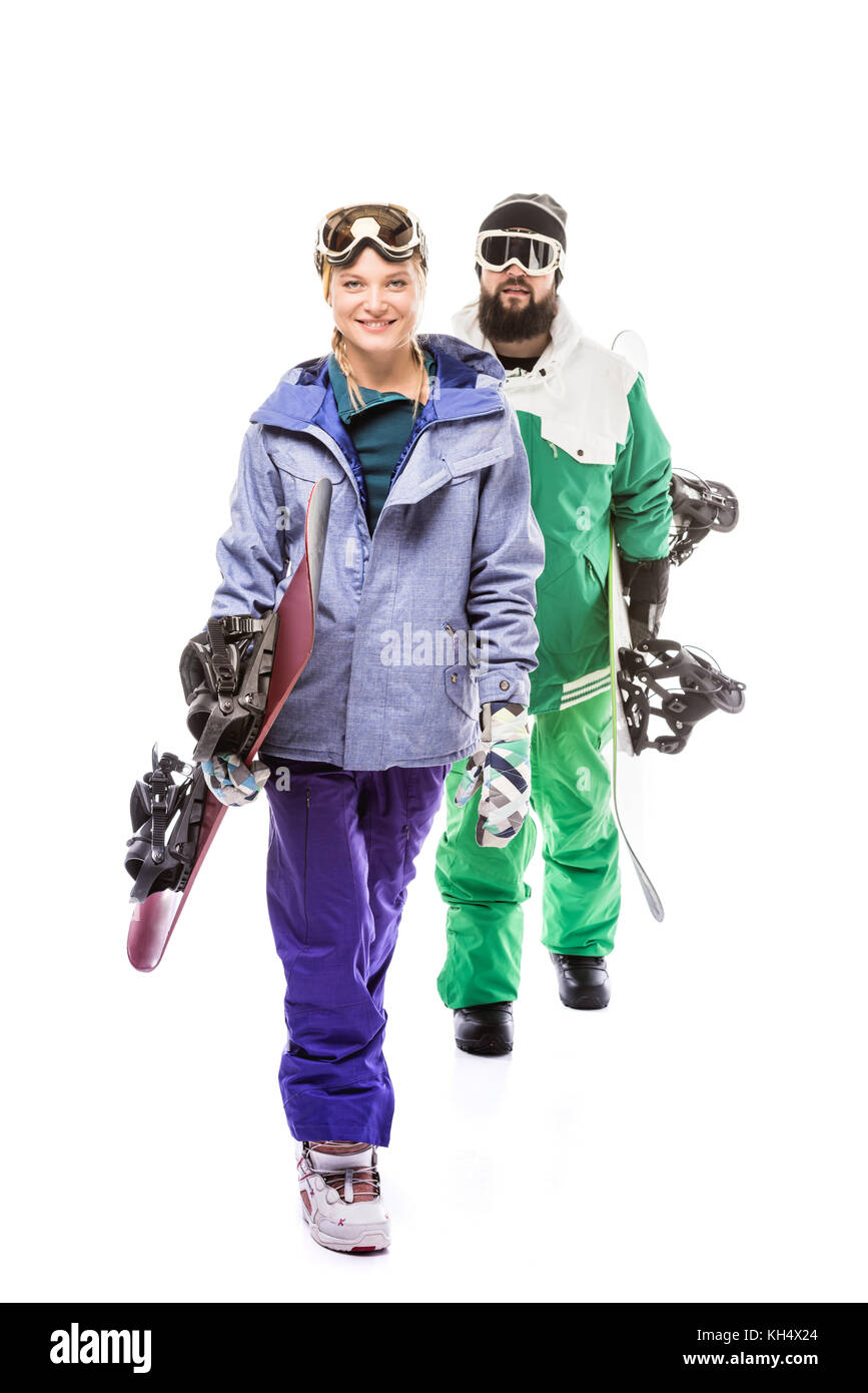 couple in snowboarding costumes with snowboards Stock Photo - Alamy