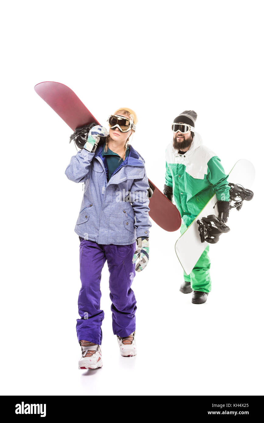 couple in snowboarding costumes with snowboards Stock Photo - Alamy