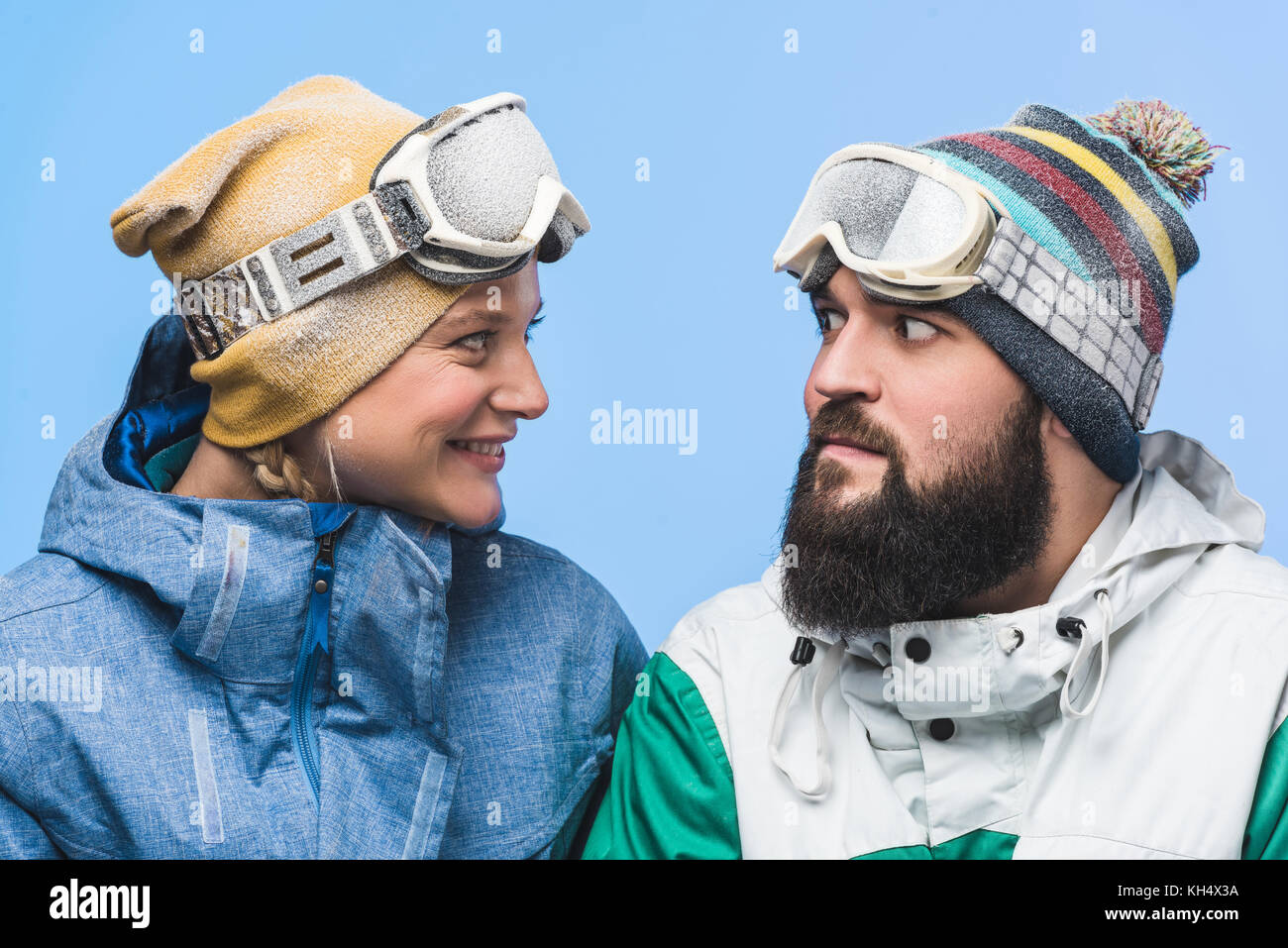 couple in snowboard clothing Stock Photo - Alamy