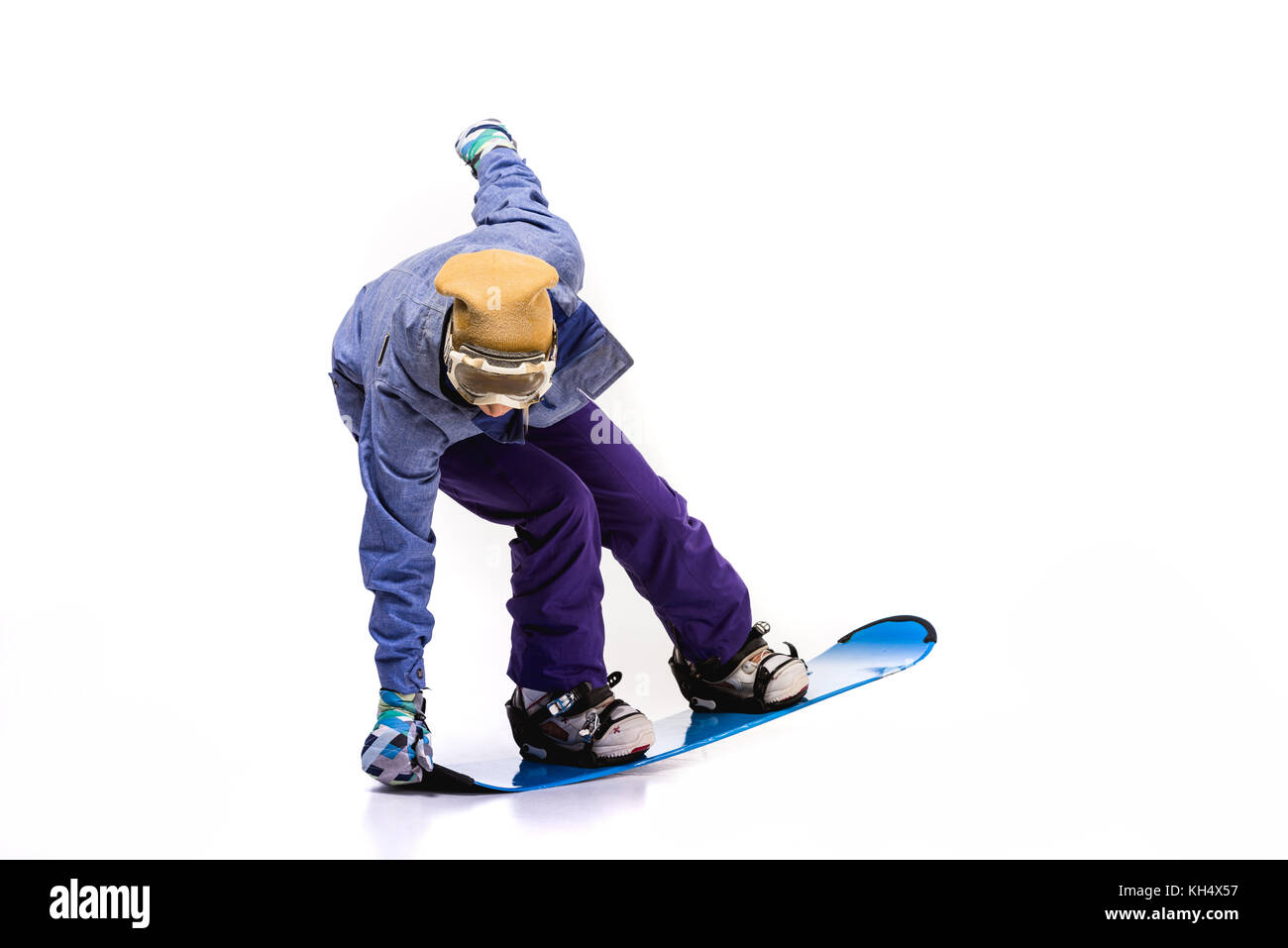 woman sliding on snowboard Stock Photo - Alamy