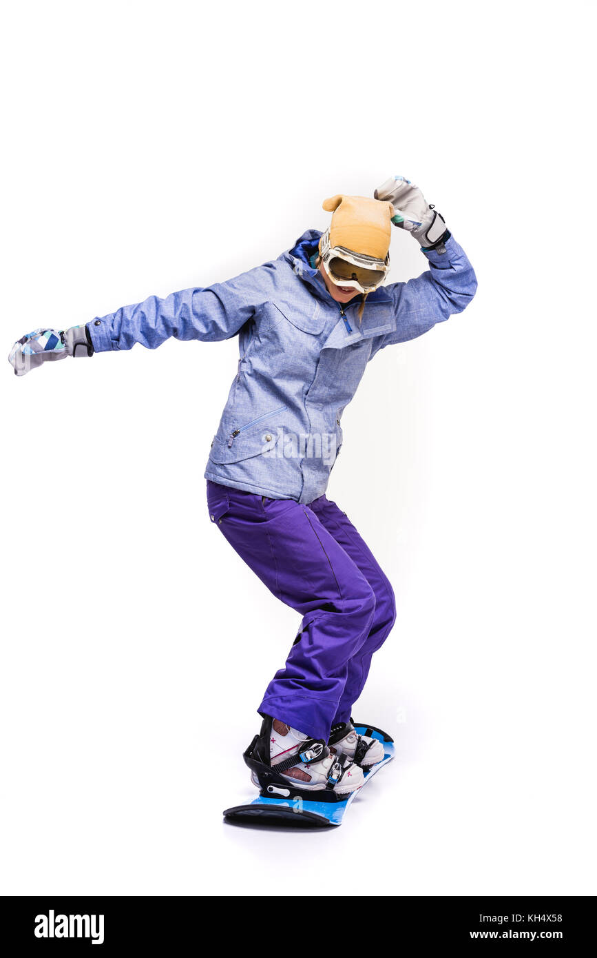woman sliding on snowboard Stock Photo - Alamy