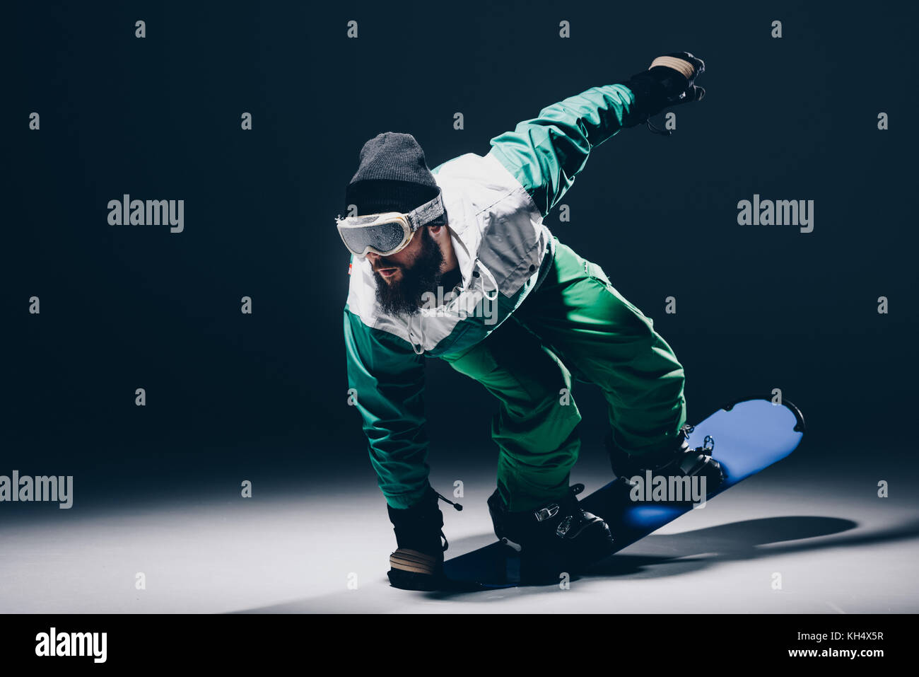snowboarder practicing on snowboard Stock Photo - Alamy