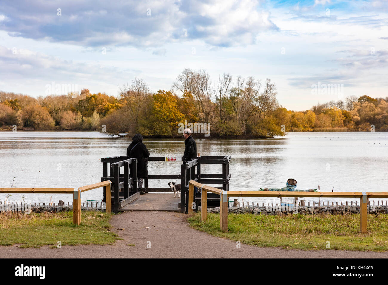 A couple tand on a platform and look at Barden Lake views in Haysden ...