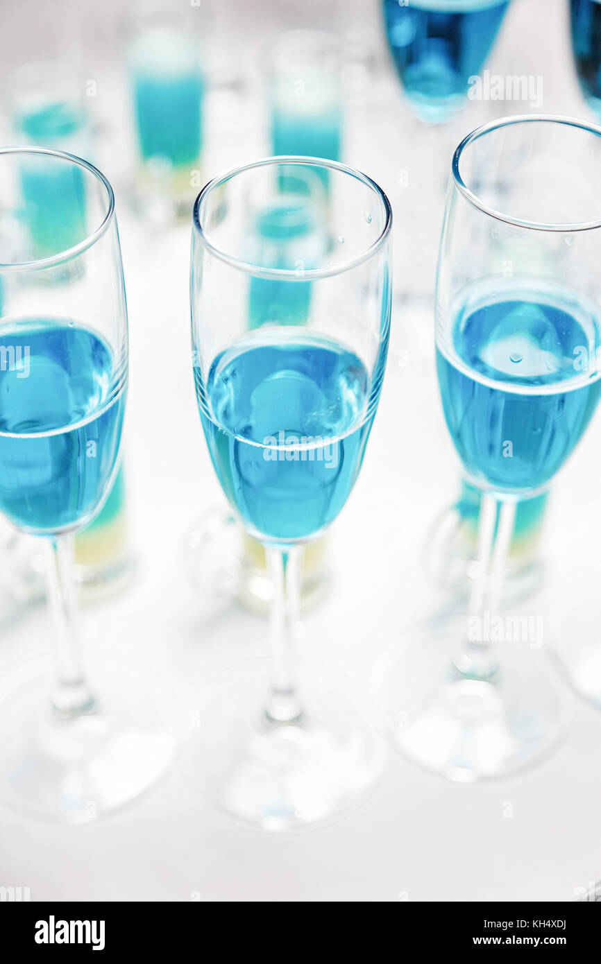 blue champagne in glasses, unusual welcome-drink Stock Photo - Alamy