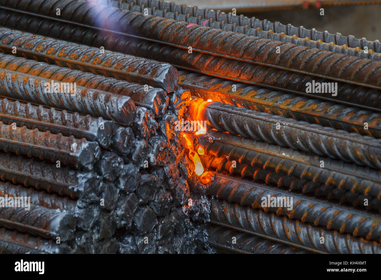 Gas cutting of metal fittings. Working gloves. Sparks Stock Photo - Alamy