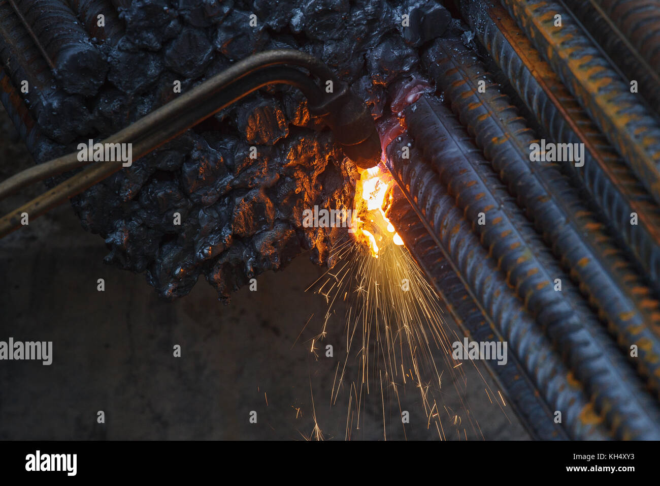 Gas cutting of metal fittings. Sparks Stock Photo - Alamy
