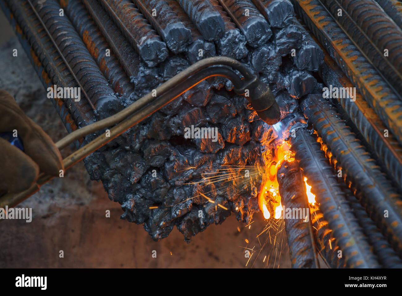 Gas cutting of metal fittings. Sparks Stock Photo - Alamy